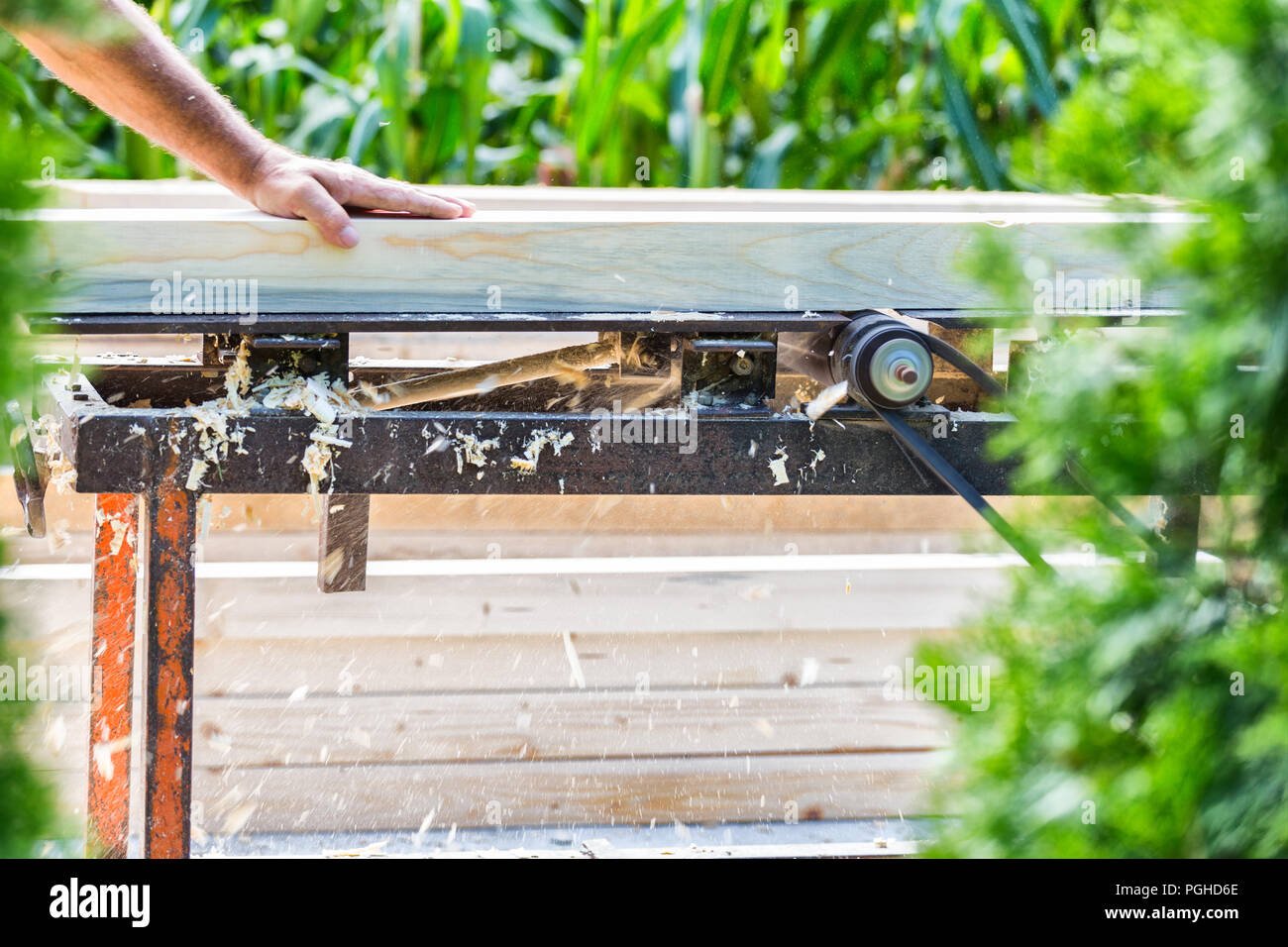 Man smoothing timber hi-res stock photography and images - Alamy