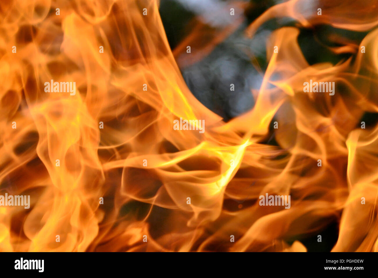 Fire. Wood burning in the fire. Orange flame. Tongue of flame Stock ...