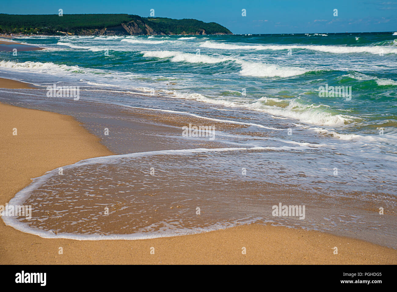 Tropical sandy beach and blue ocean Stock Photo - Alamy