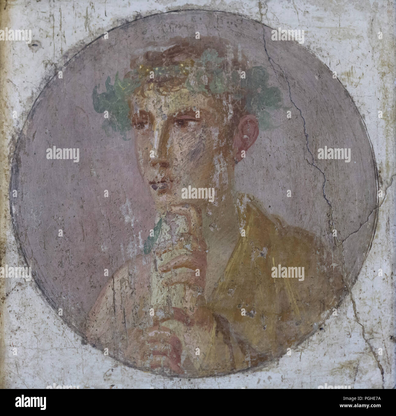 Medallion with a portrait of a young poet with parchment roll and ivy ...