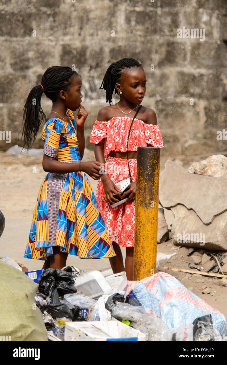 ACCRA, GHANA - Jan 8, 2017: Unidentified Ghanaian girls with braids in ...