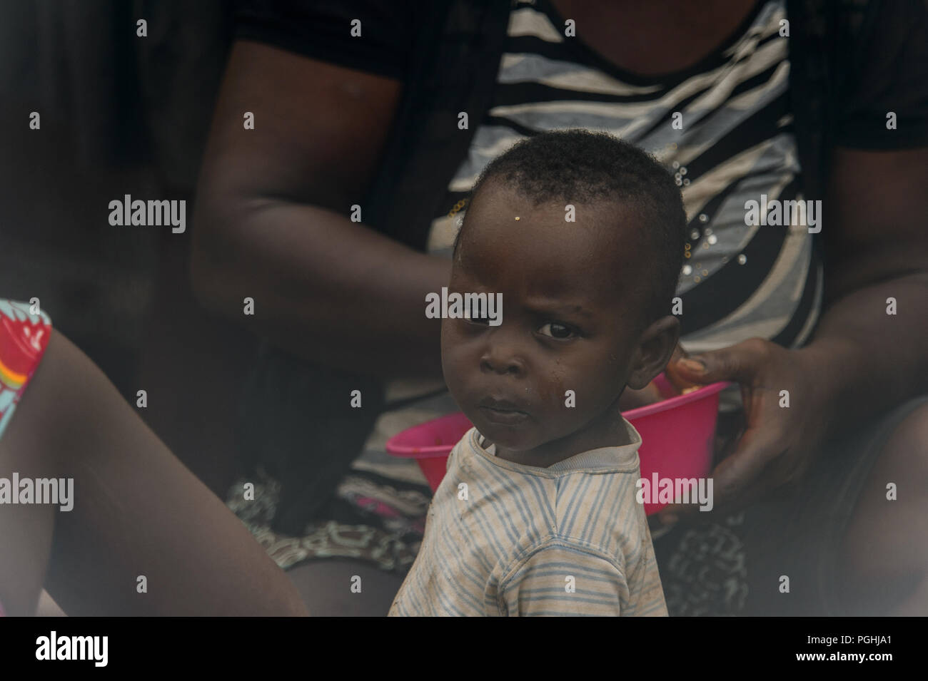ACCRA, GHANA - Jan 8, 2017: Unidentified Ghanaian little girt with ...