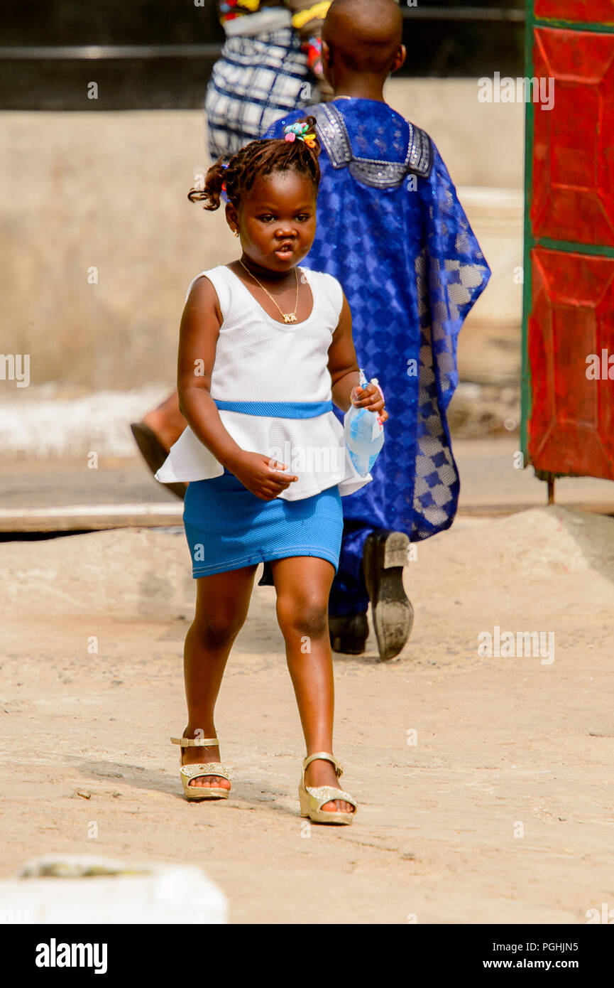ACCRA, GHANA - Jan 8, 2017: Unidentified Ghanaian little girl walks at ...