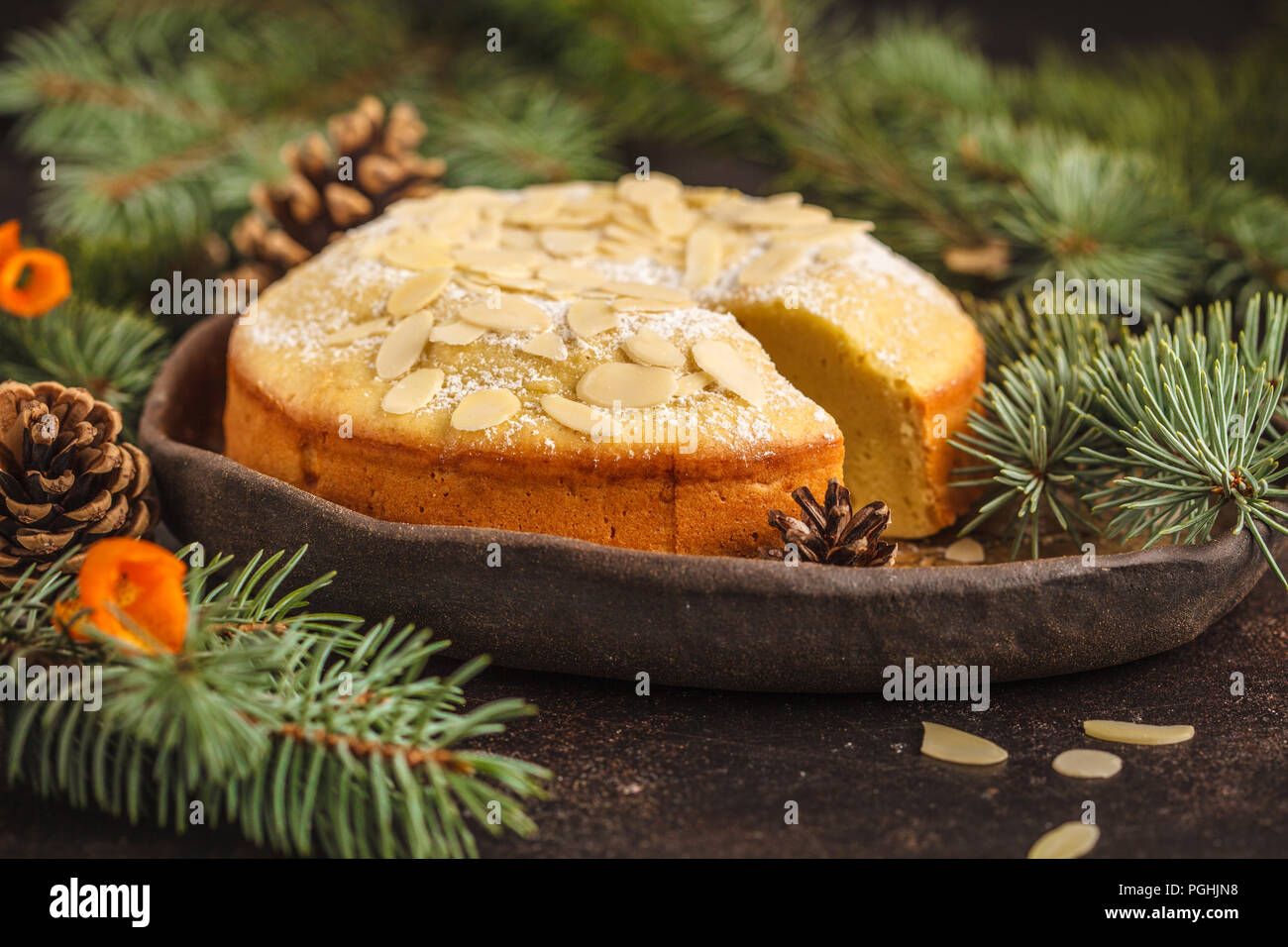Traditional Christmas (Norwegian) almond cake in Christmas decorations ...