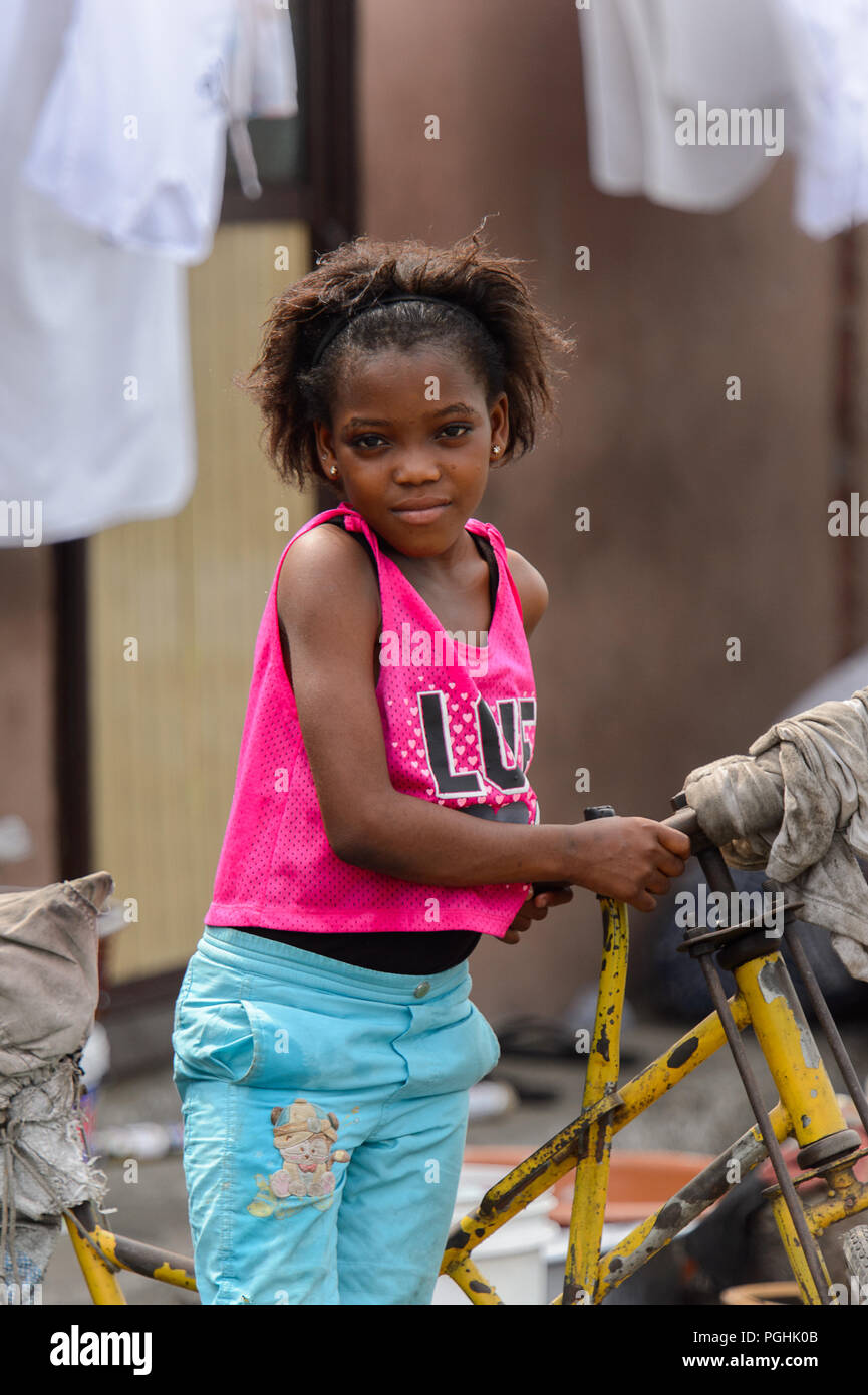 ACCRA, GHANA - Jan 8, 2017: Unidentified Ghanaian little girl holds her ...
