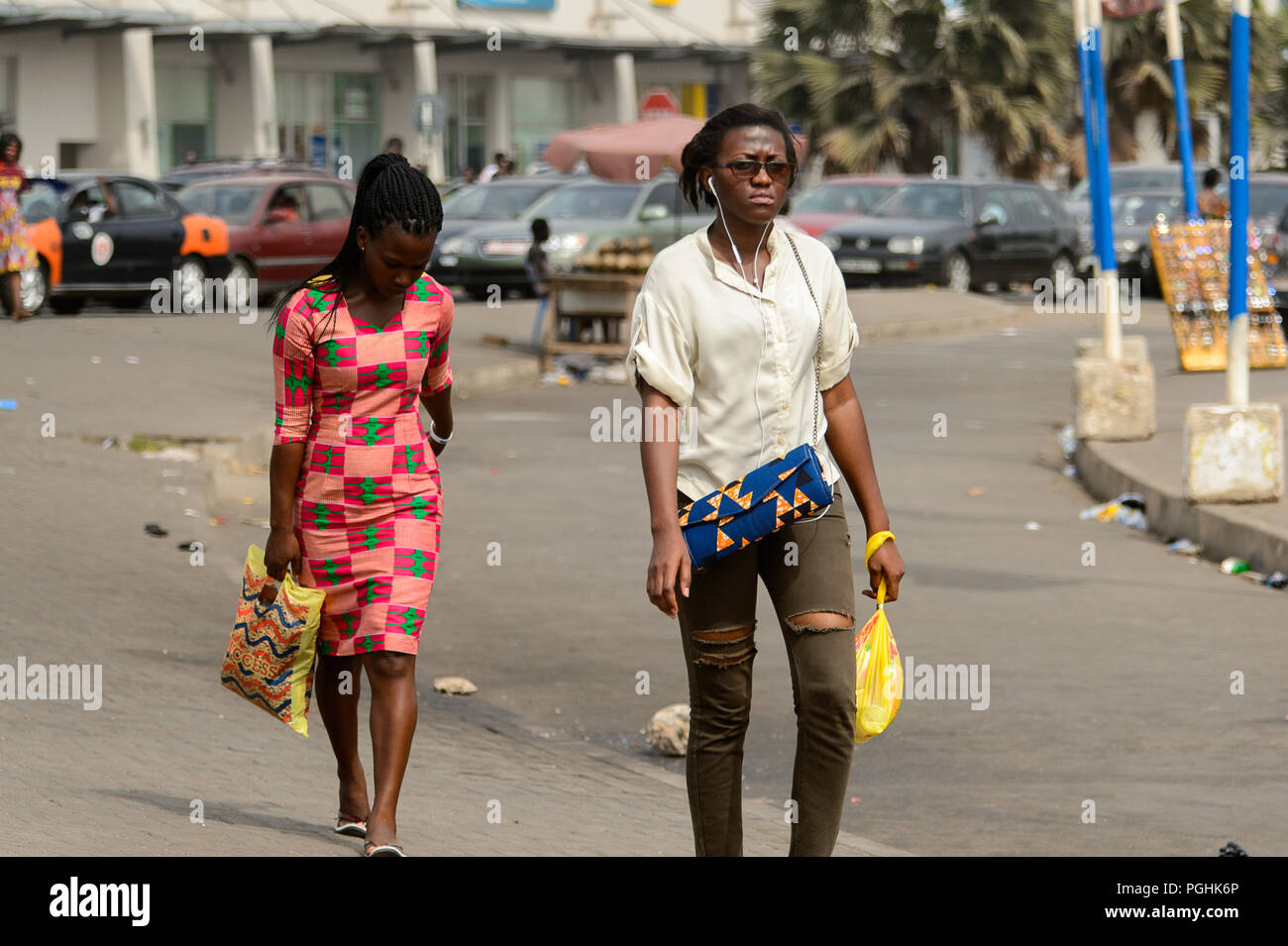 ACCRA, GHANA - Jan 8, 2017: Unidentified Ghanaian women walk on the ...