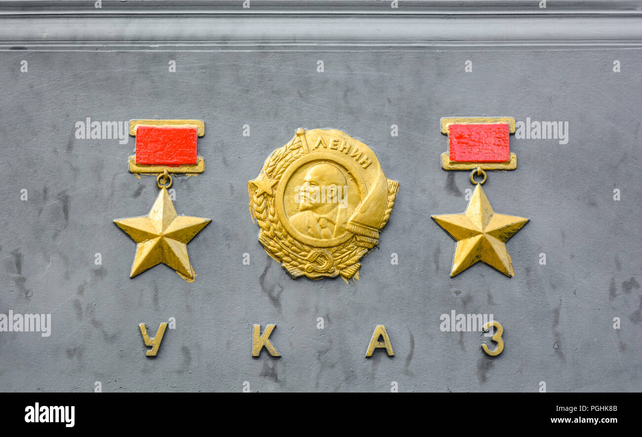 Signs of Order Hero of Soviet Union Gold Star and emblem with portrait ...