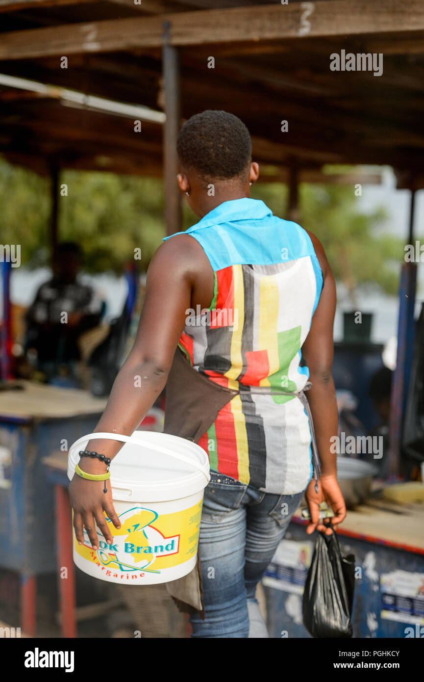ACCRA, GHANA - Jan 8, 2017: Unidentified Ghanaian woman carries a ...