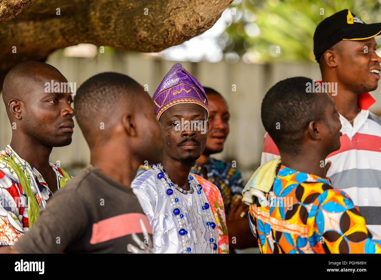 OUIDAH, BENIN - Jan 10, 2017: Unidentified Beninese men in colored ...