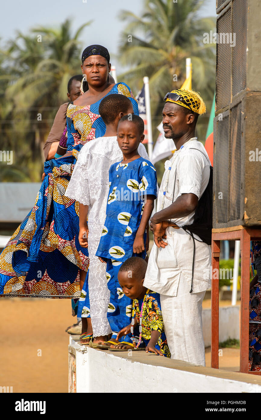 OUIDAH, BENIN - Jan 10, 2017: Unidentified Beninese people in colored ...