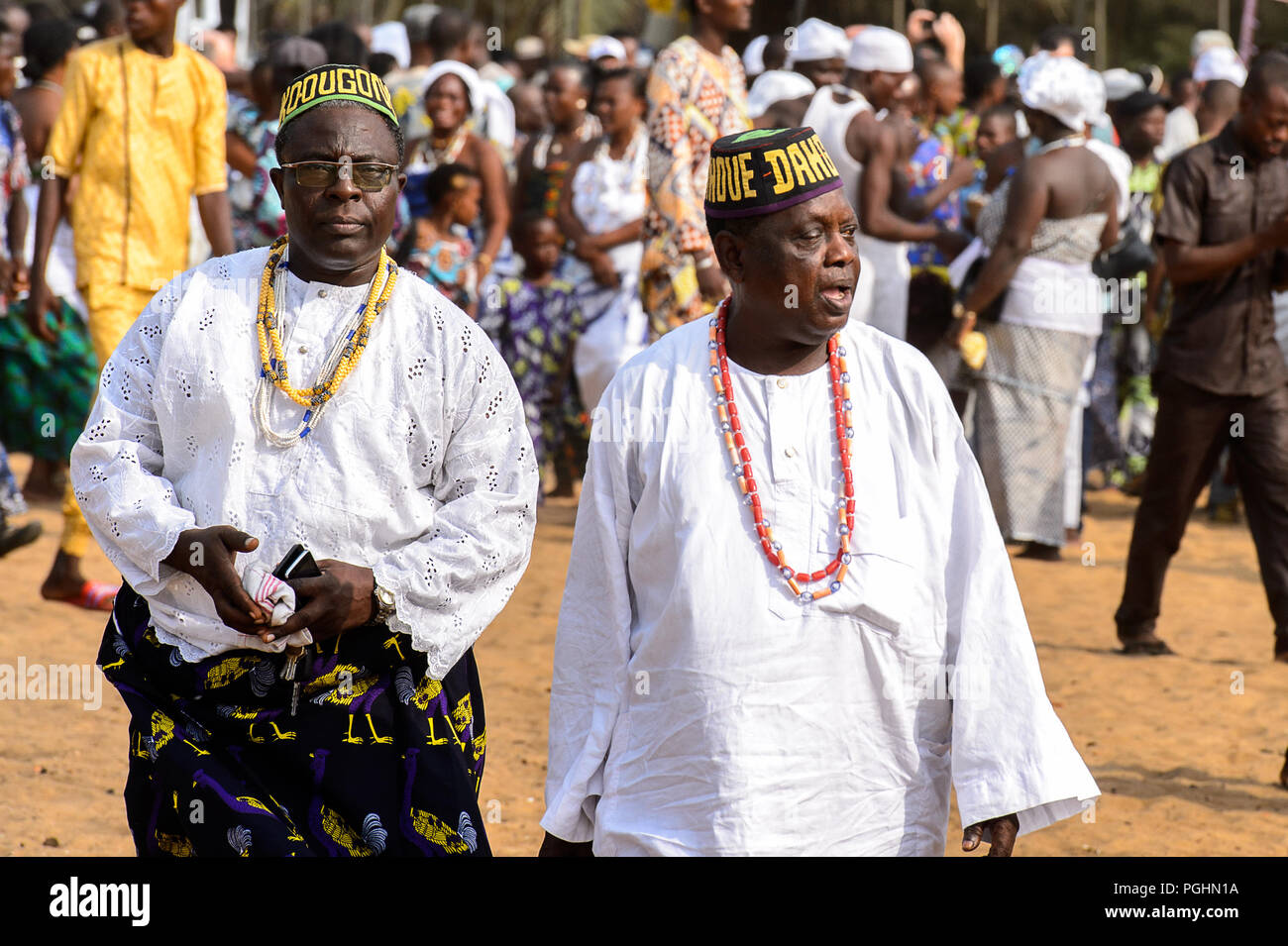 OUIDAH, BENIN - Jan 10, 2017: Unidentified Beninese people in colored ...