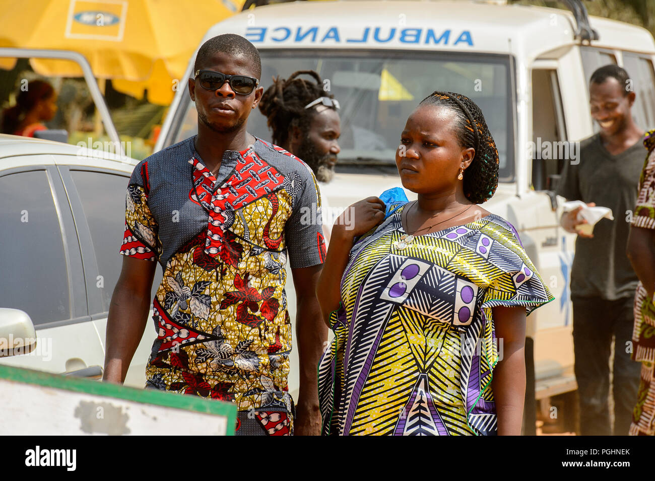 OUIDAH, BENIN - Jan 10, 2017: Unidentified Beninese people in colored ...