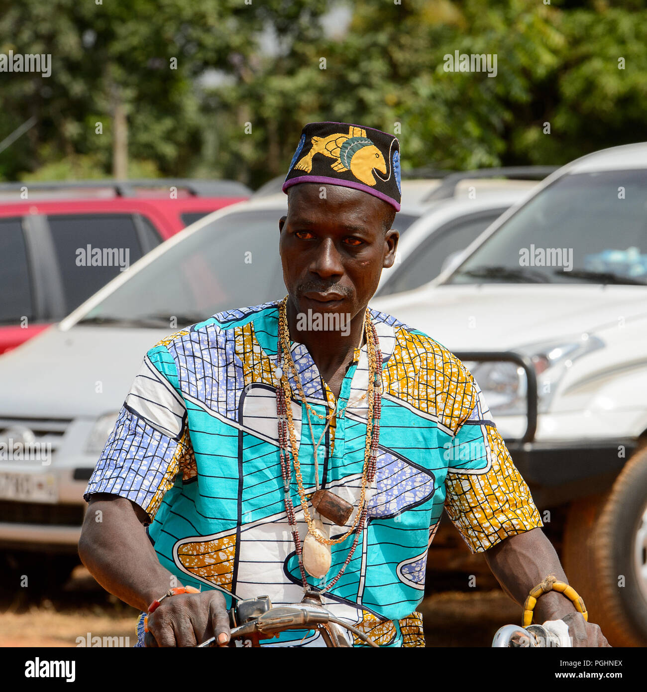 OUIDAH, BENIN - Jan 10, 2017: Unidentified Beninese man in colored ...