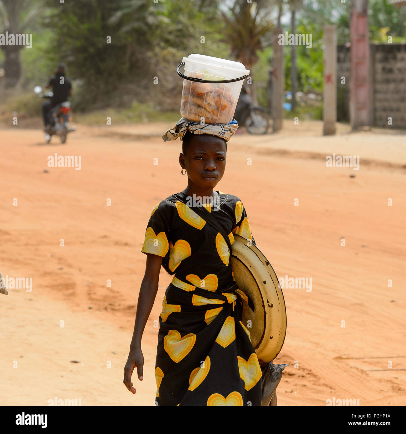 OUIDAH, BENIN - Jan 10, 2017: Unidentified Beninese young girl in ...