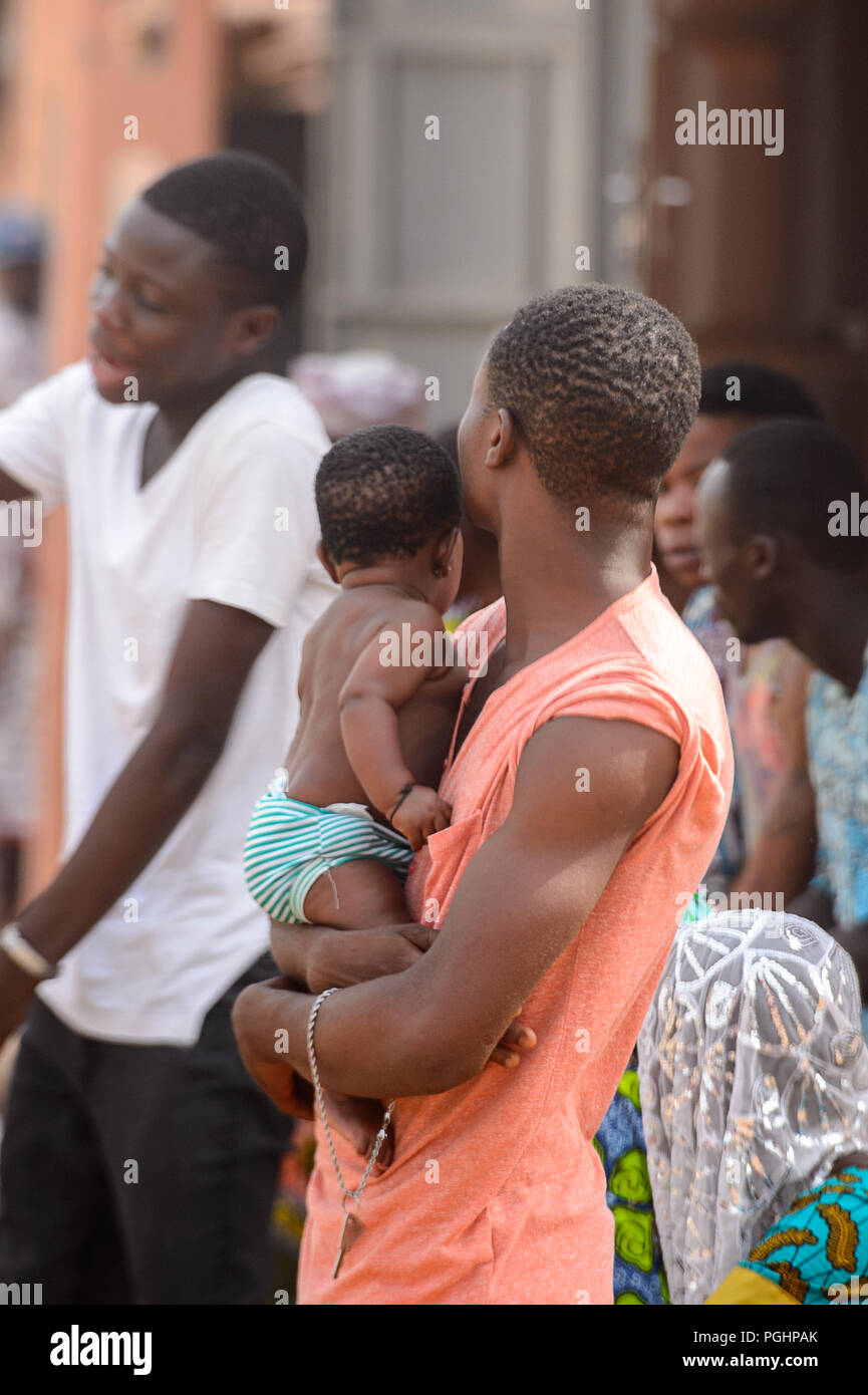 OUIDAH, BENIN - Jan 10, 2017: Unidentified Beninese baby girl is ...