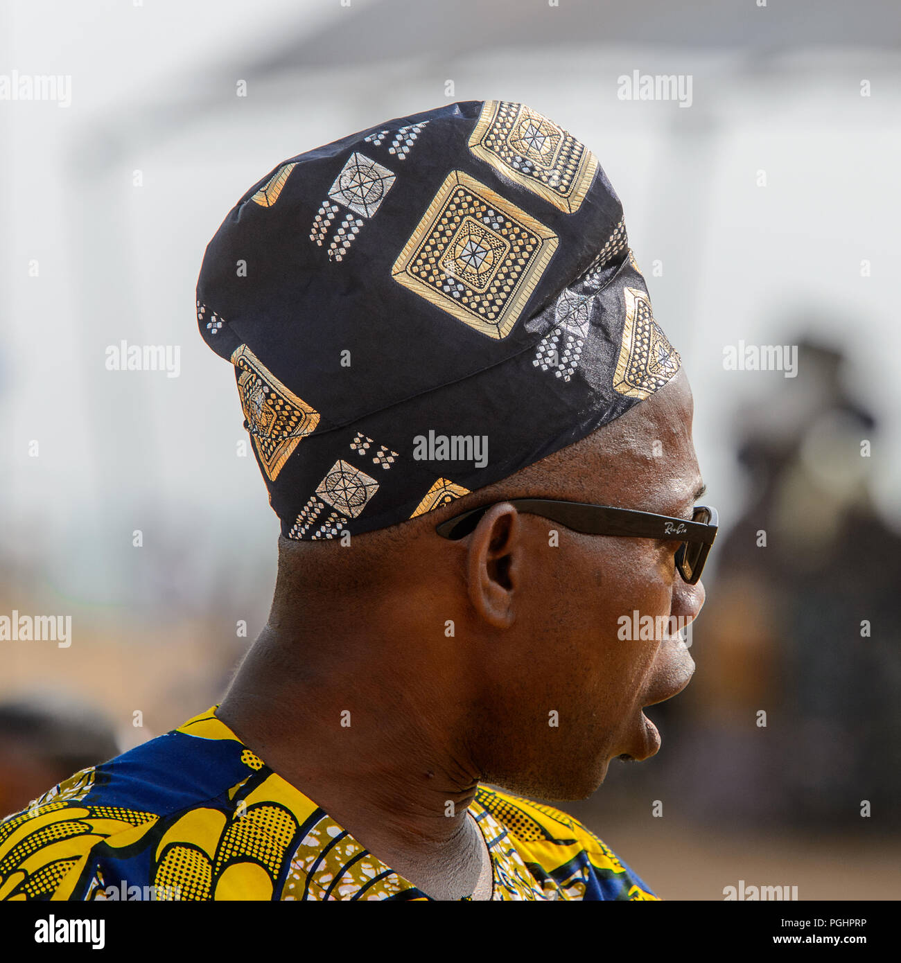 OUIDAH, BENIN - Jan 10, 2017: Unidentified Beninese man in colored ...