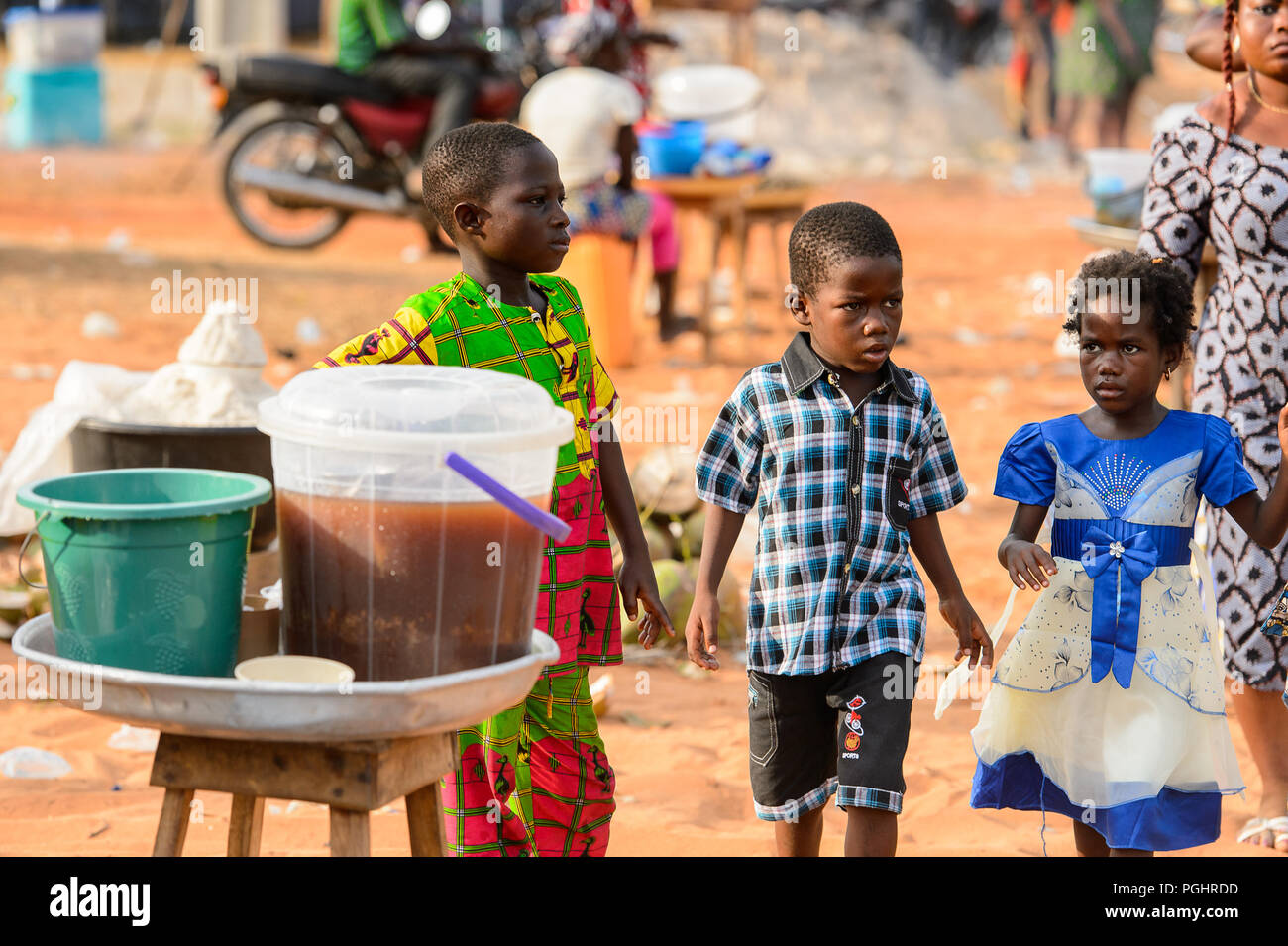 OUIDAH, BENIN - Jan 10, 2017: Unidentified Beninese children walk at ...