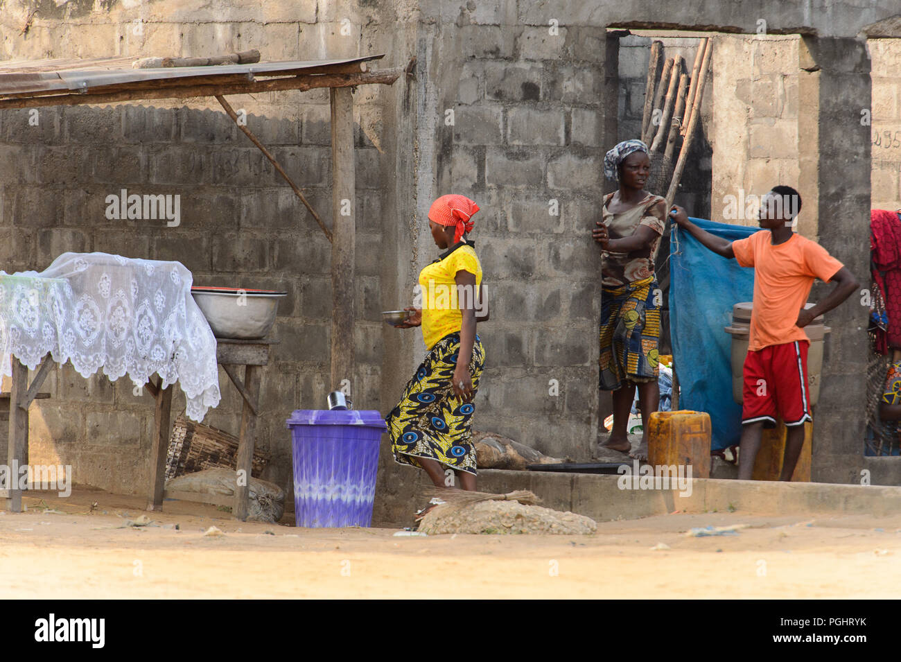 OUIDAH, BENIN - Jan 10, 2017: Unidentified Beninese people near the ...