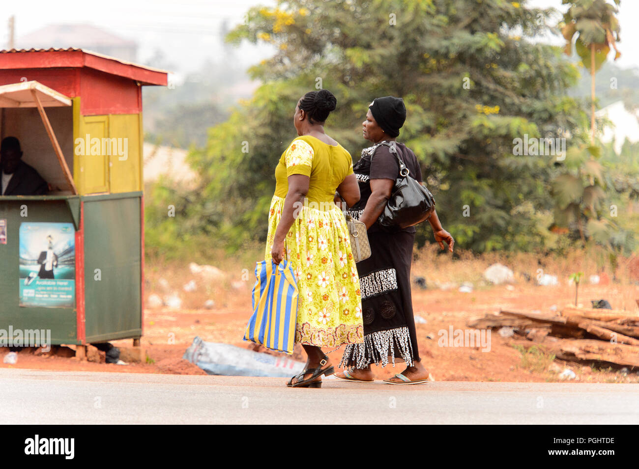 KUMASI, GHANA - Jan 16, 2017: Unidentified Ghanaian women walk along ...