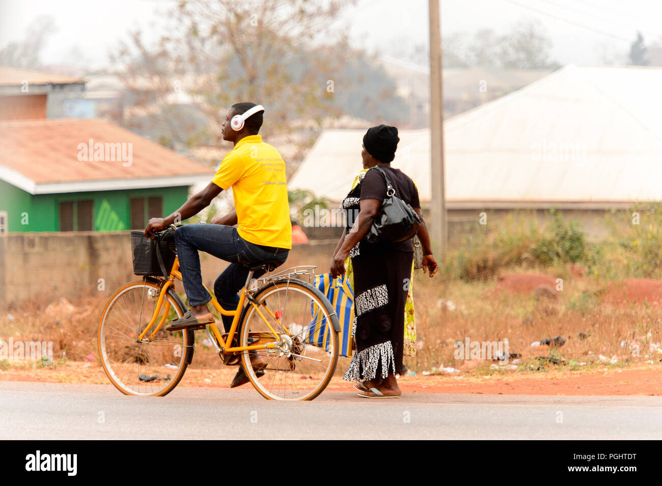 KUMASI, GHANA - Jan 16, 2017: Unidentified Ghanaian man in yellow shirt ...