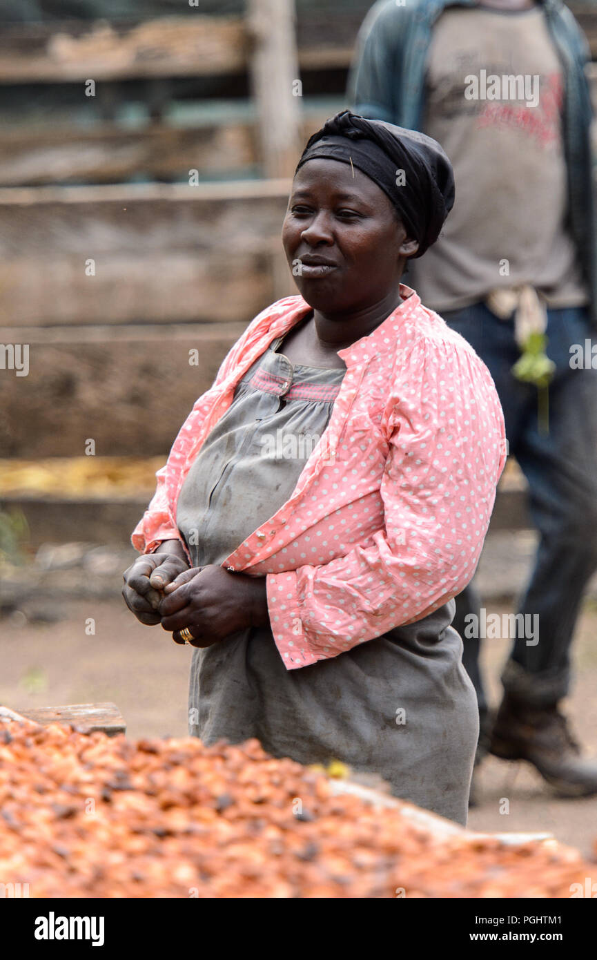 KUMASI, GHANA - Jan 16, 2017: Unidentified Ghanaian woman in pink shirt ...