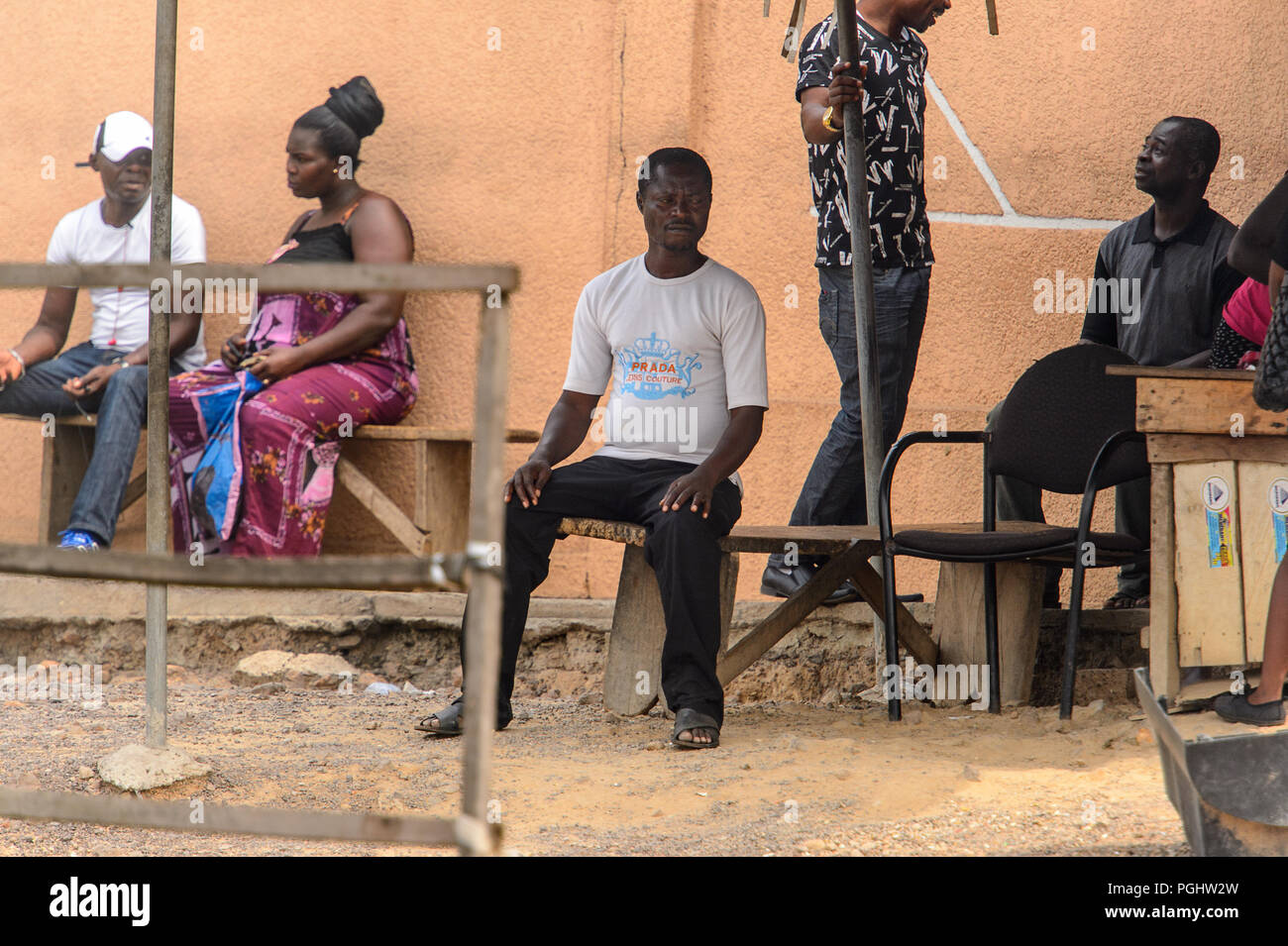 KUMASI, GHANA - Jan 16, 2017: Unidentified Ghanaian man sits on the ...