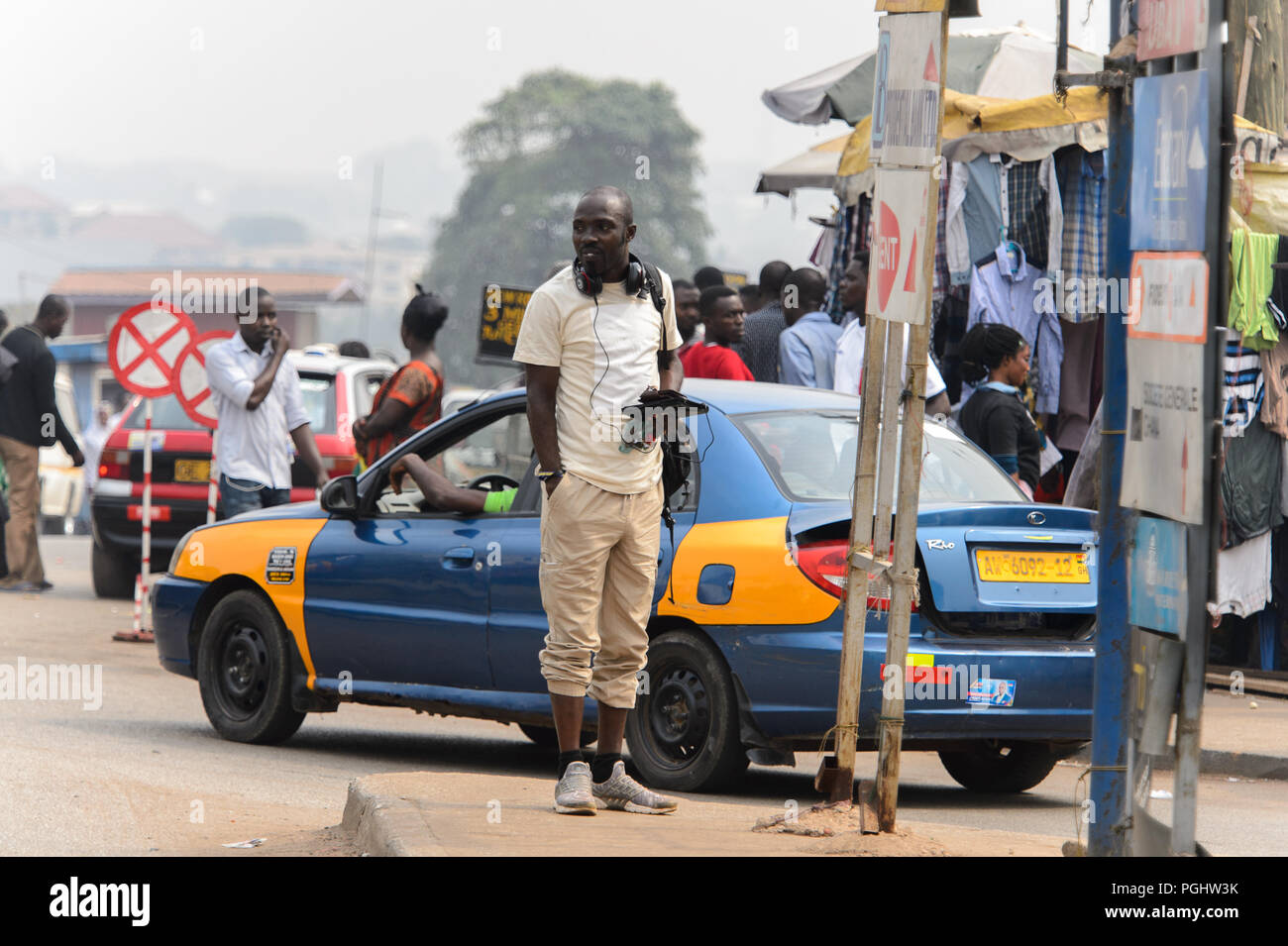 KUMASI, GHANA - Jan 16, 2017: Unidentified Ghanaian man in beige suit ...