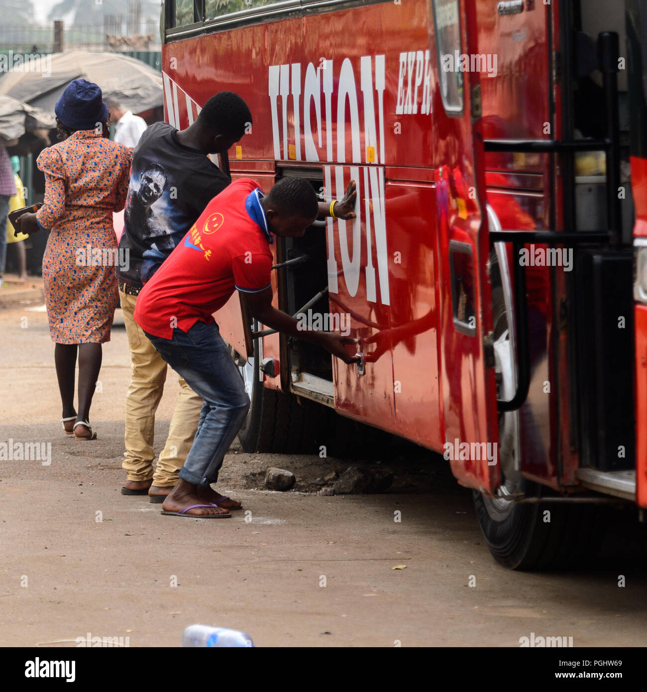 KUMASI, GHANA - Jan 16, 2017: Unidentified Ghanaian people stand near ...