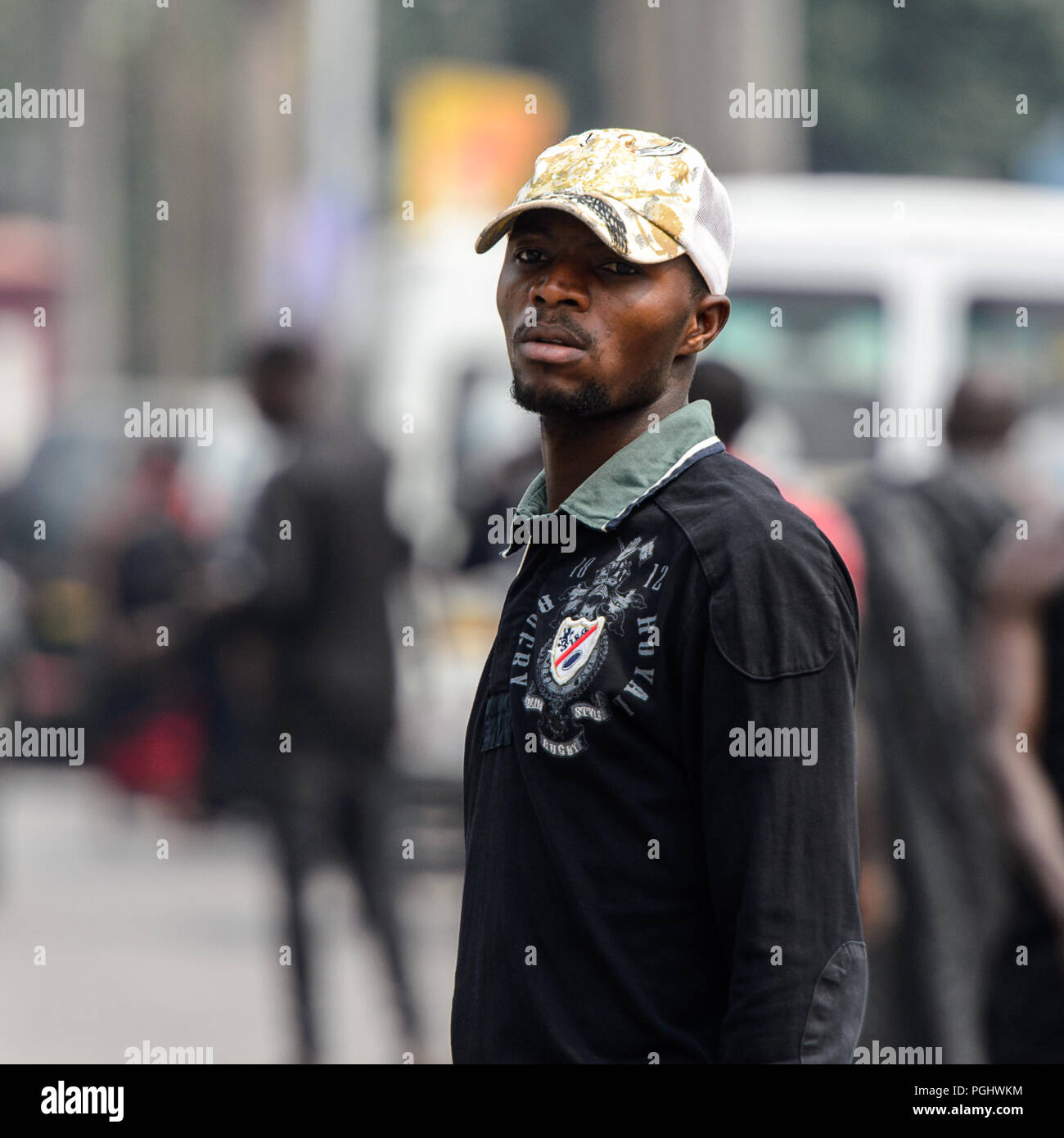 KUMASI, GHANA - Jan 16, 2017: Unidentified Ghanaian man in black shirt ...