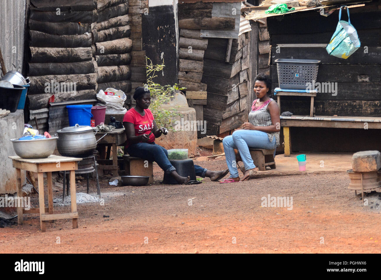 KUMASI, GHANA - Jan 16, 2017: Unidentified Ghanaian women cook on the ...