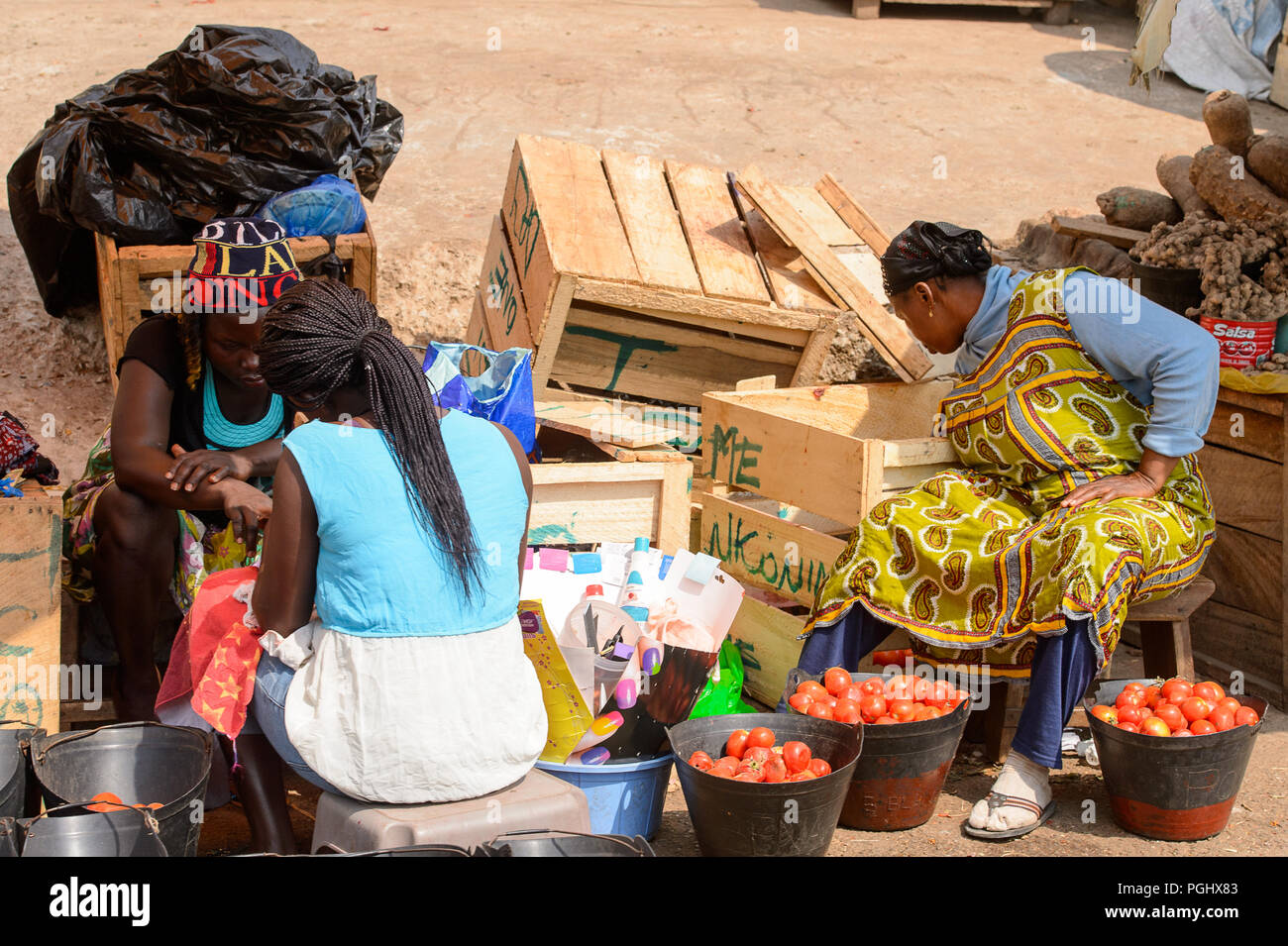 CENTRAL REGION, GHANA - Jan 17, 2017: Unidentified Ghanaian woman sorts ...