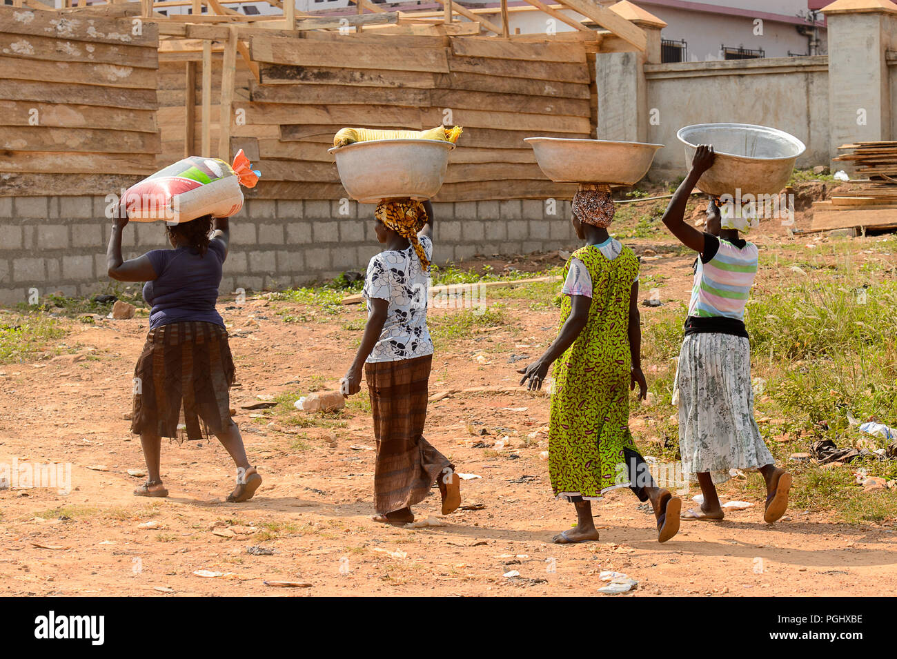 CENTRAL REGION, GHANA - Jan 17, 2017: Unidentified Ghanaian women walk ...