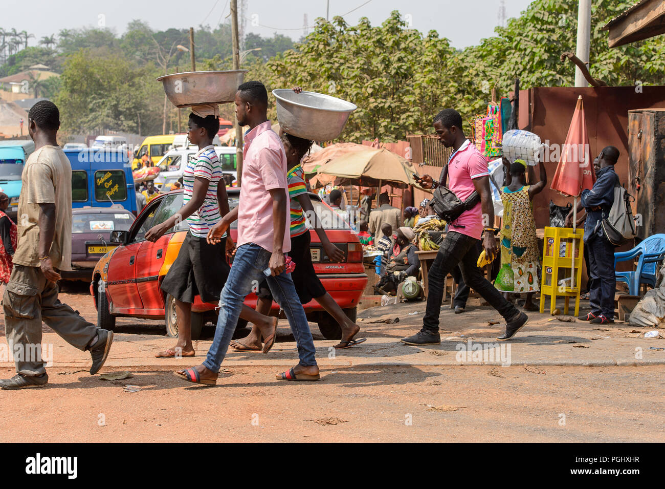 CENTRAL REGION, GHANA - Jan 17, 2017: Unidentified Ghanaian people walk ...