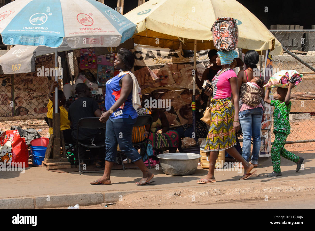 CENTRAL REGION, GHANA - Jan 17, 2017: Unidentified Ghanaian people walk ...