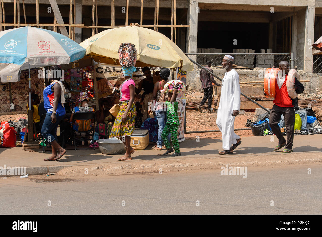 CENTRAL REGION, GHANA - Jan 17, 2017: Unidentified Ghanaian people walk ...