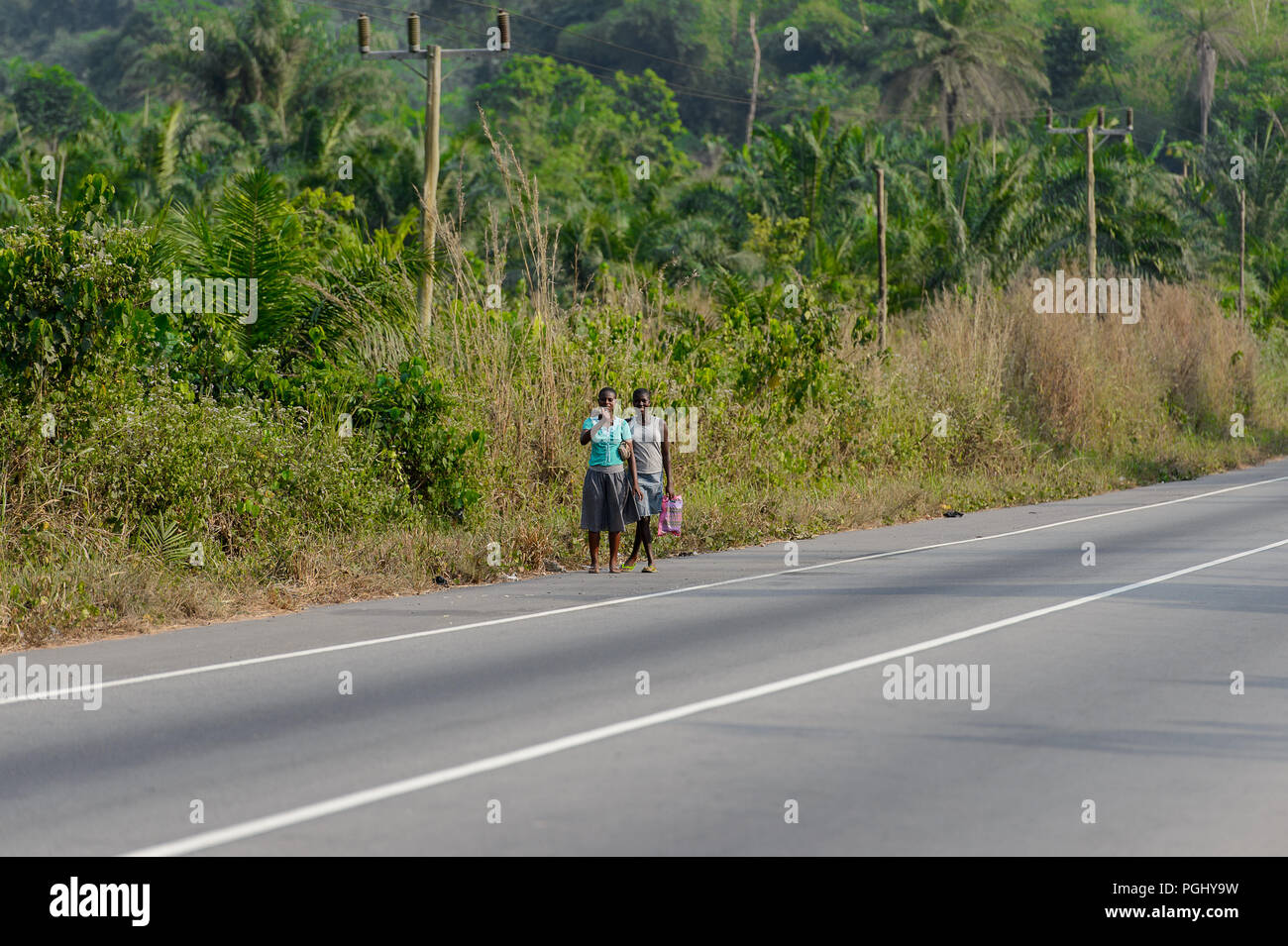 CENTRAL REGION, GHANA - Jan 17, 2017: Unidentified Ghanaian people walk ...