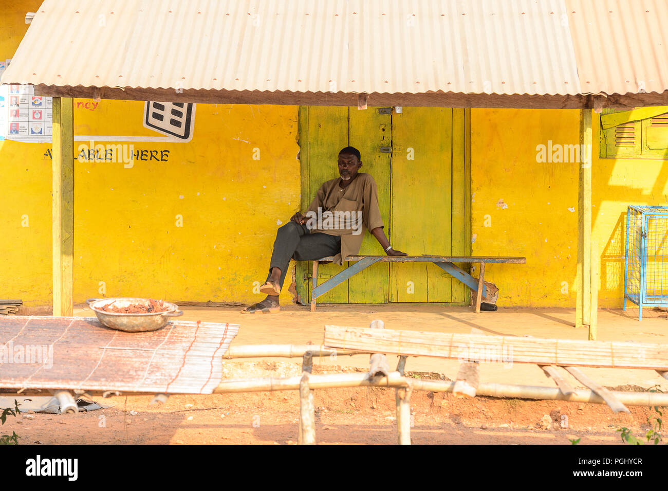 CENTRAL REGION, GHANA - Jan 17, 2017: Unidentified Ghanaian man sits on ...