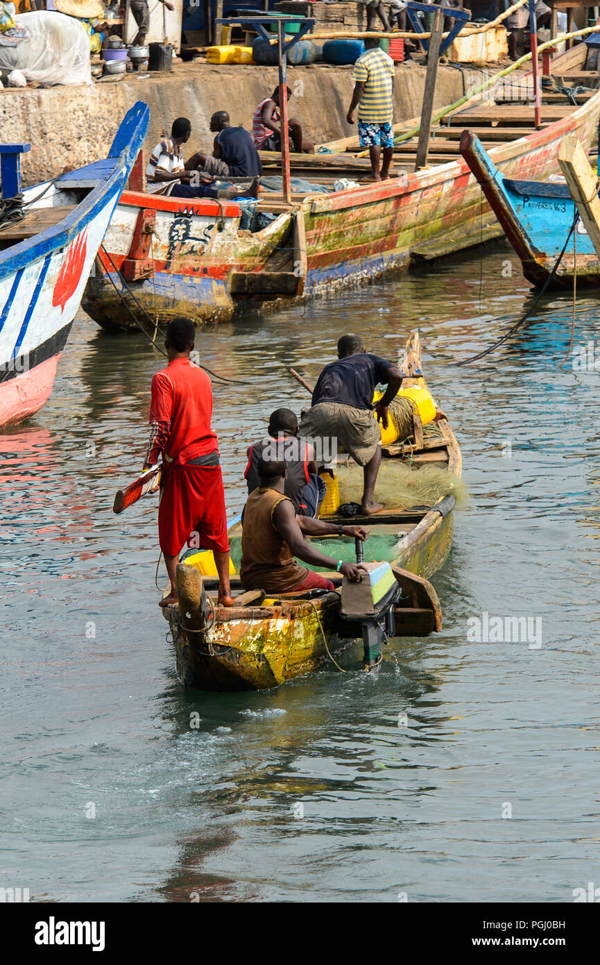 ELMINA, GHANA -JAN 18, 2017: Unidentified Ghanaian men sail in boat in ...
