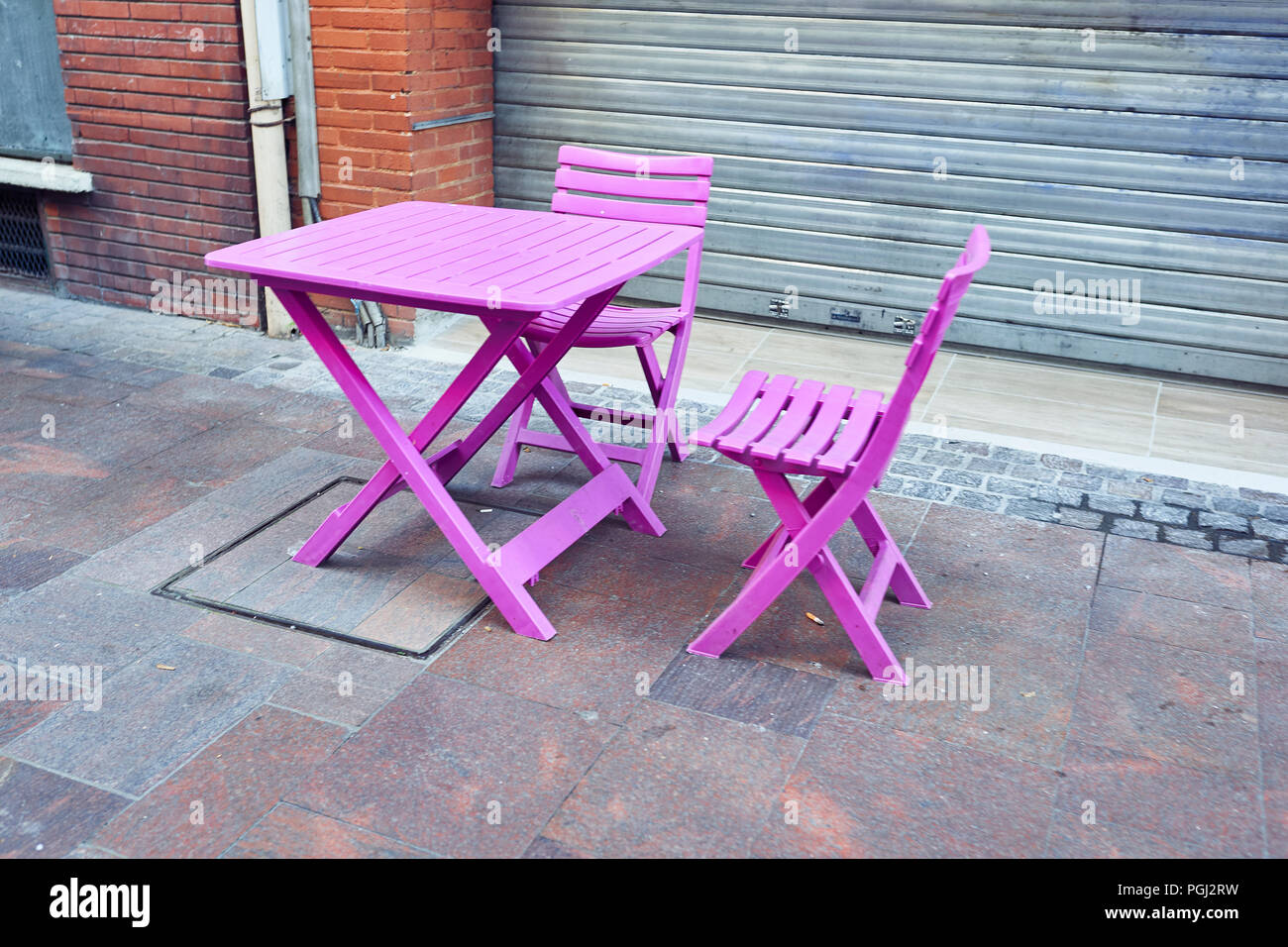 colorful tables on the terrace of a bar Stock Photo - Alamy