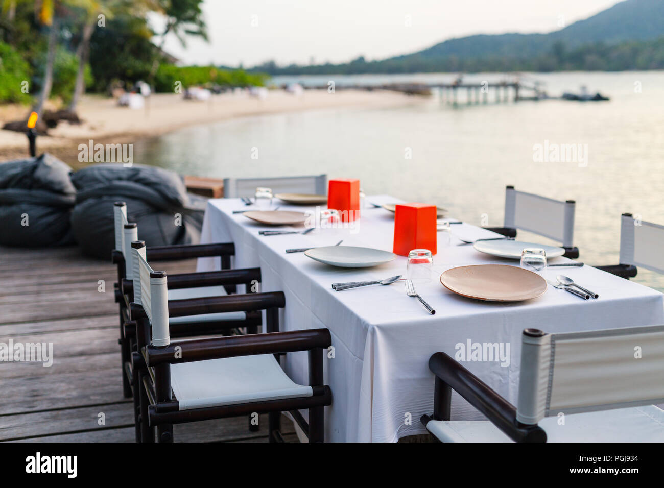 Romantic luxury dinner setting at tropical resort on sunset Stock Photo ...