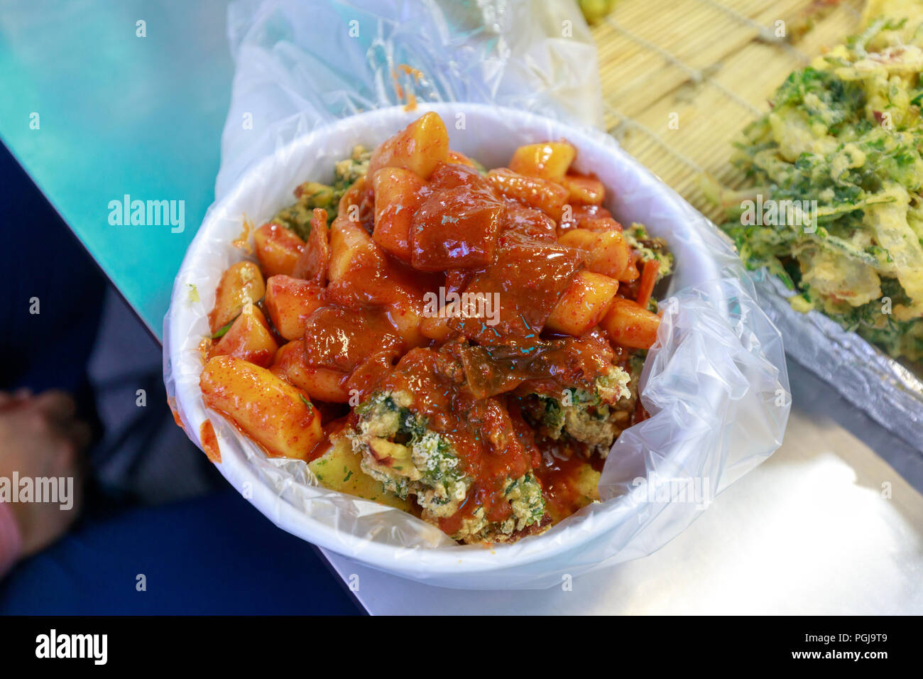 Tteok-bokki, stir-fried rice cakes, which is a popular Korean street ...