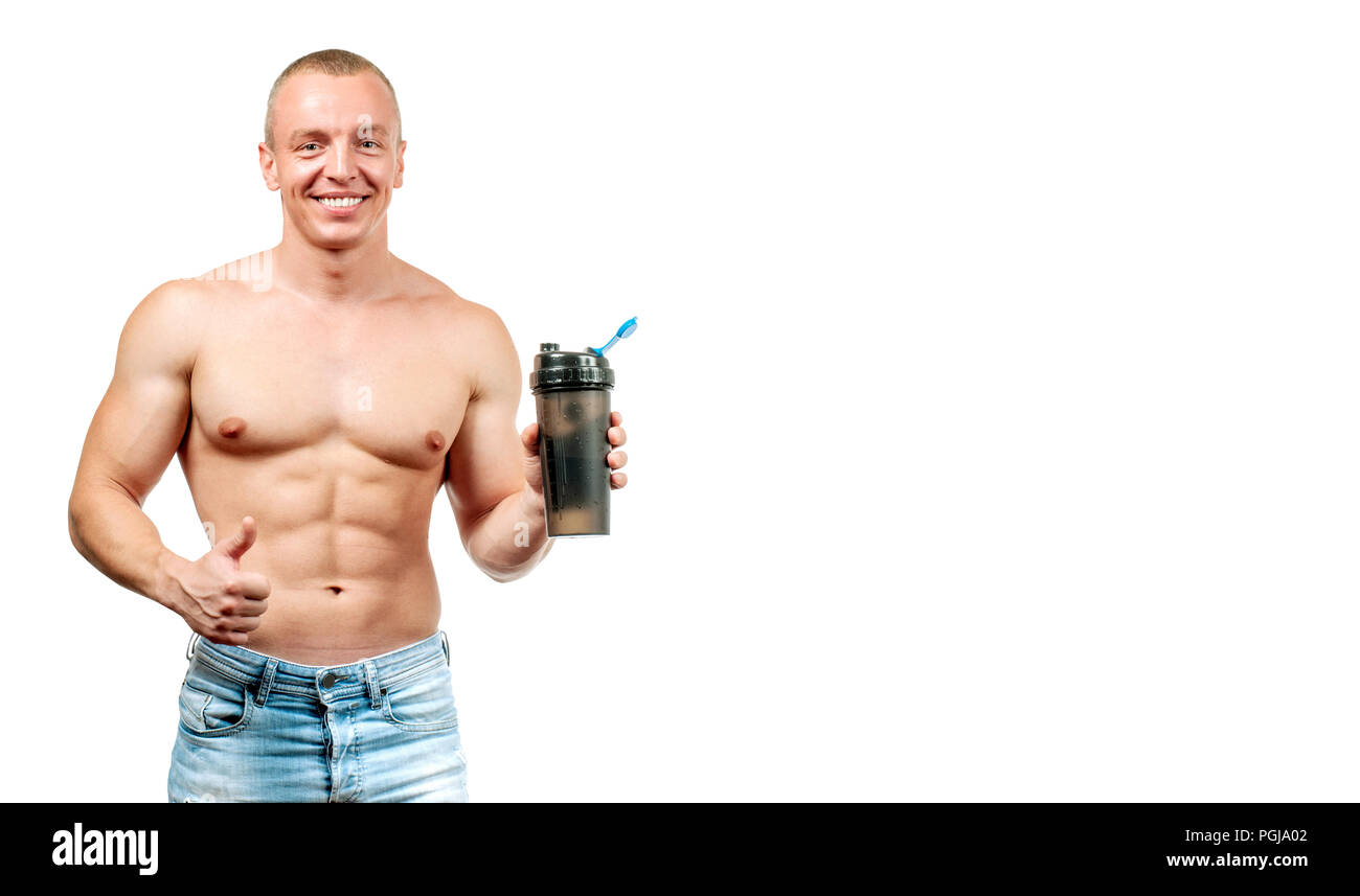 Handsome muscular man taking protein sports nutrition Stock Photo - Alamy