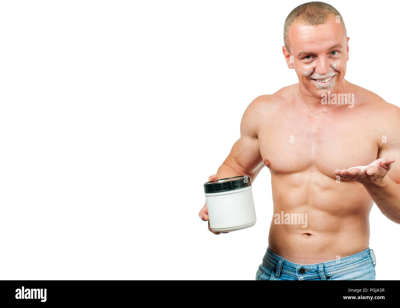 Handsome muscular man taking protein sports nutrition Stock Photo - Alamy
