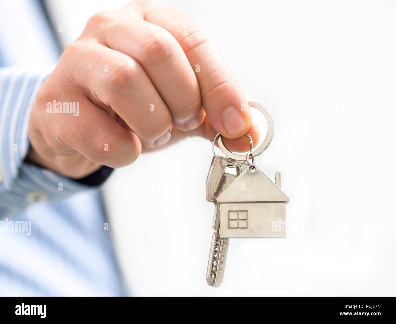Business man holding key new hi-res stock photography and images - Alamy