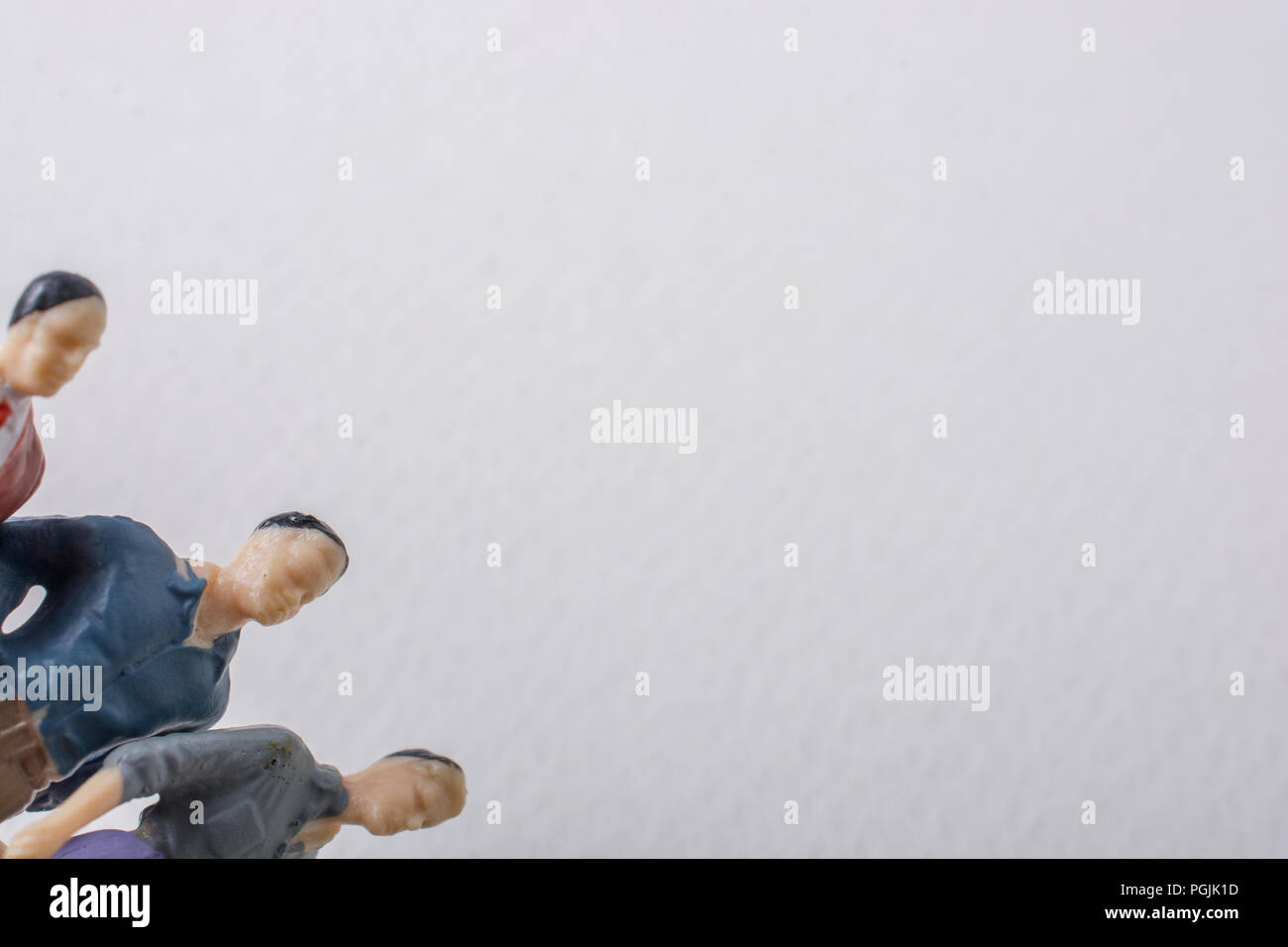 Tiny figurine of men miniature model in view Stock Photo - Alamy