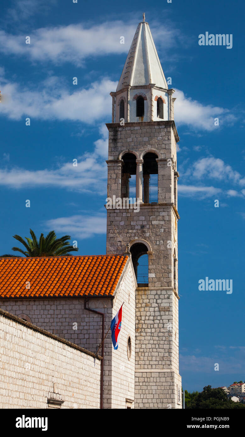 Old bell tower with Croatian flag hanging next to it (Dubrovnik ...