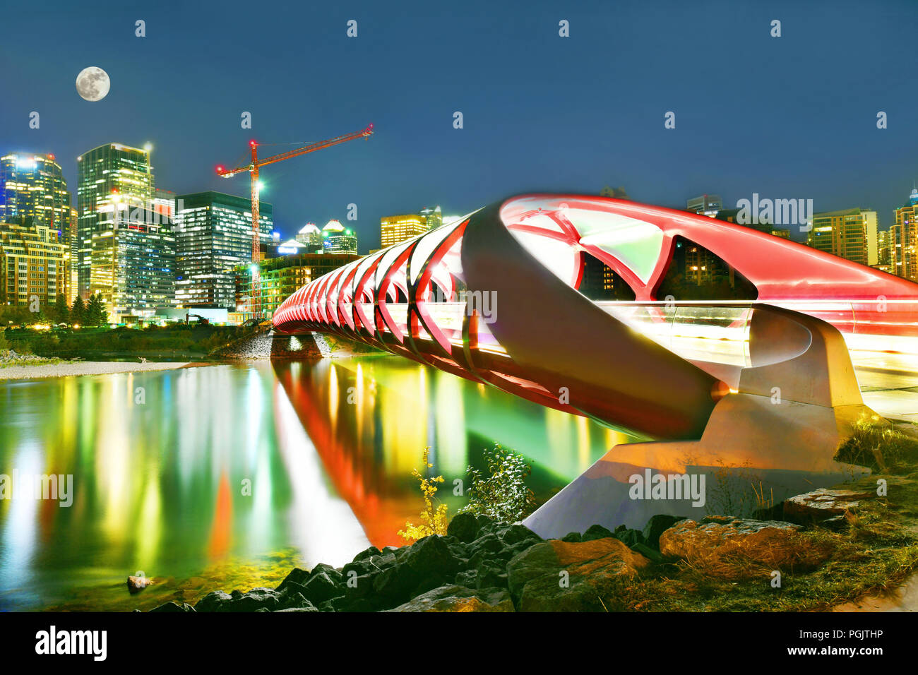 Peace Bridge with Bow River and part of the Calgary downtown in Alberta ...