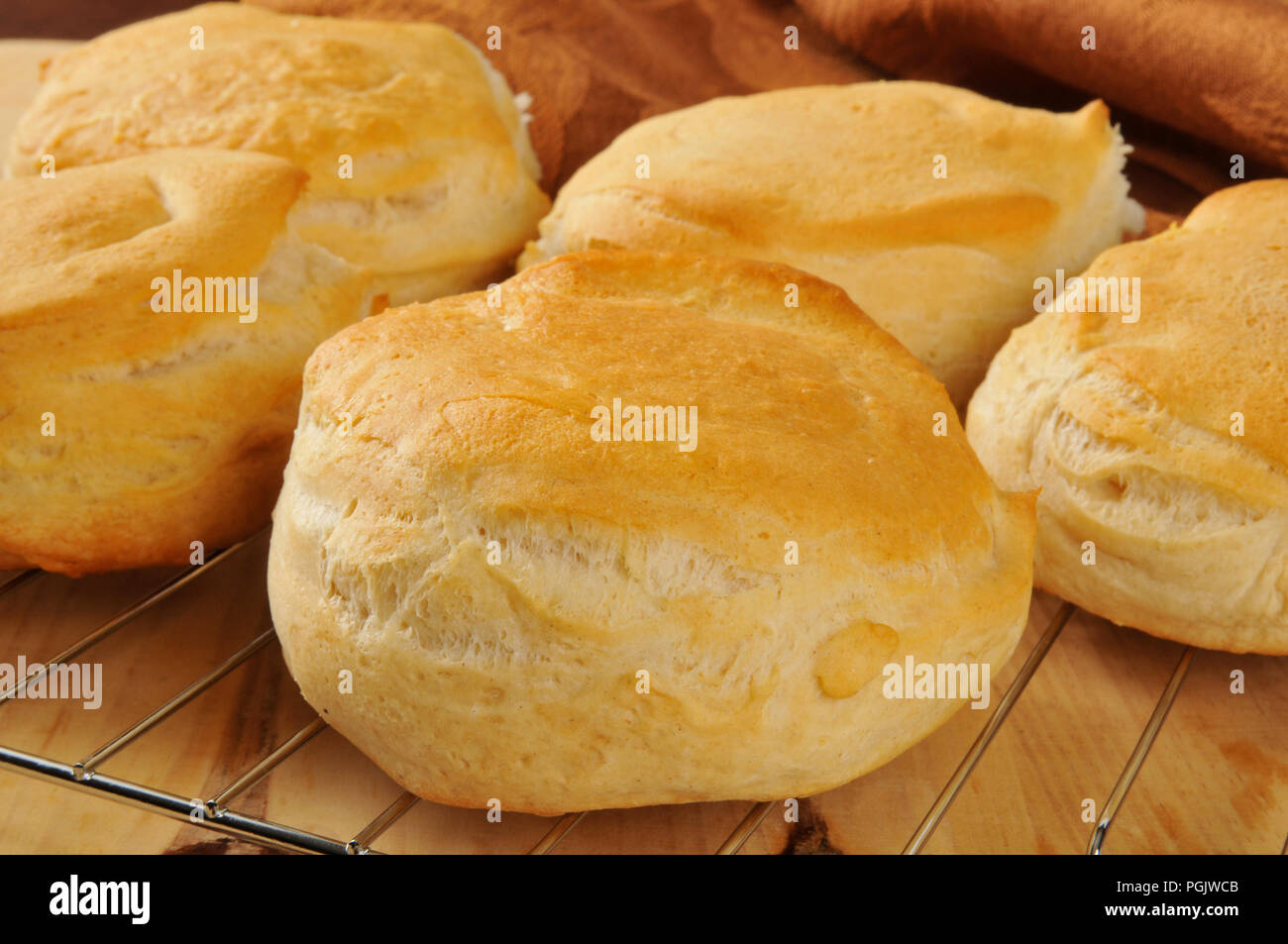 Fresh baked buttermilk biscuits cooling on a wire rack Stock Photo - Alamy