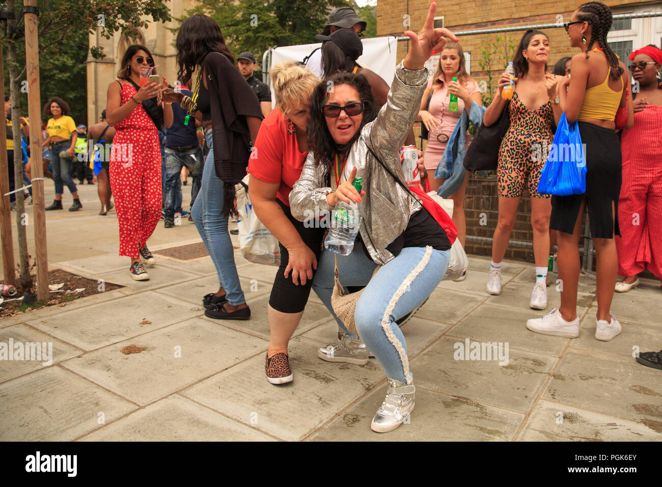 Powis Square, London, UK, 27th August 2108, Notting Hill Carnival goers ...