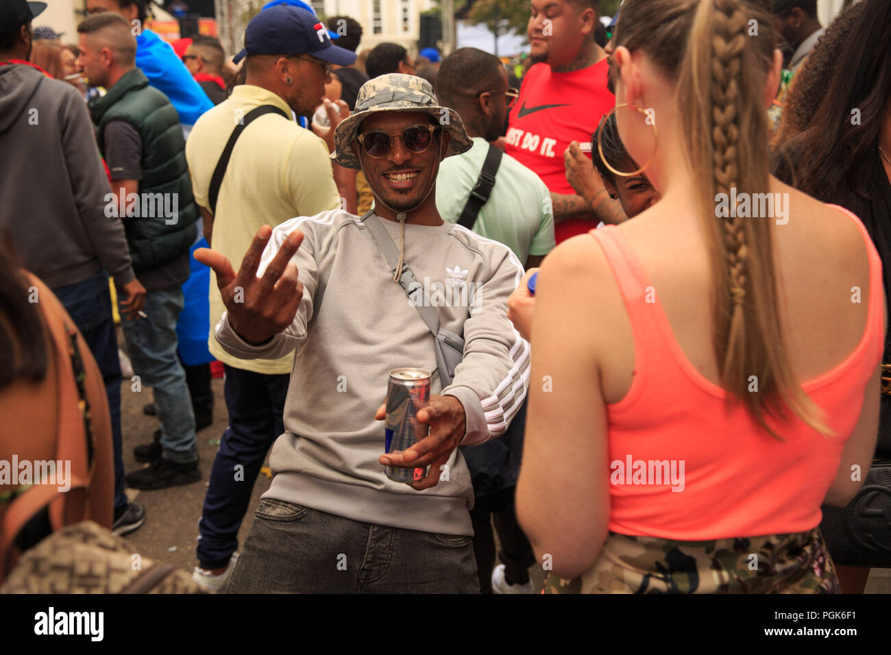 Powis Square, London, UK, 27th August 2108, Notting Hill Carnival goers ...